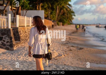 young model at one of beaches at the westcoast in mauritius island ...
