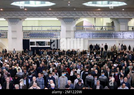 Tehran, Tehran, Iran. 9th Dec, 2022. An Iranian man holds an Iran flag ...
