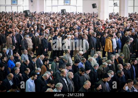 Tehran, Tehran, Iran. 9th Dec, 2022. An Iranian boy holds a green ...
