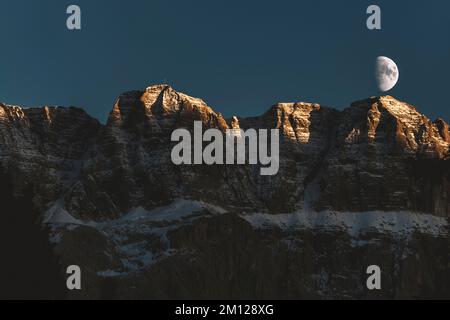 Moon over the Sella Massif Stock Photo - Alamy