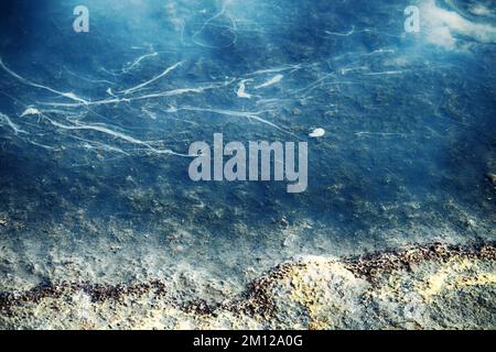 Hydrogen sulfide stagnant salt marsh. Gas turns turbid blue in water on ...