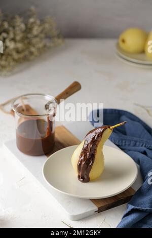 Poire belle Helene - French dessert made from poached pears served with ...