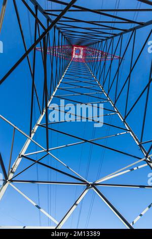 high-voltage pylon from below Stock Photo - Alamy