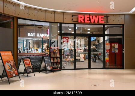 The entrance of a Rewe supermarket Stock Photo - Alamy