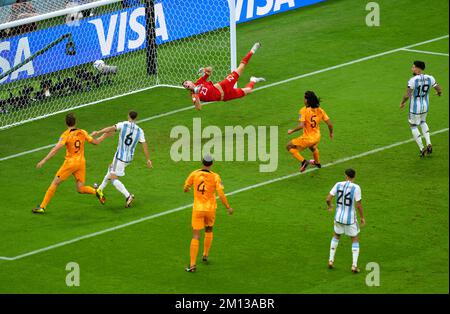 Argentina goalkeeper Emiliano Martinez fails to stop Netherlands' Wout ...