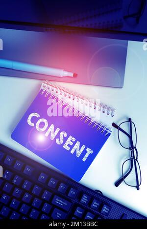 Hand writing sign Consent. Word for general agreement about particular ...