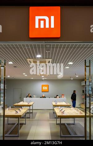 Xiaomi Mi store. Signboard logo above entrance to store. Xiaomi Inc ...