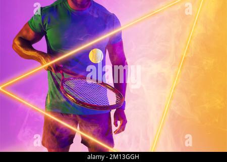 Midsection of african american male player with racket by triangles on ...