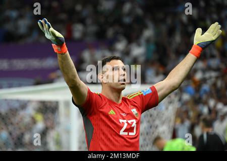 Argentina goalkeeper Emiliano Martinez saves a penalty kick from France ...