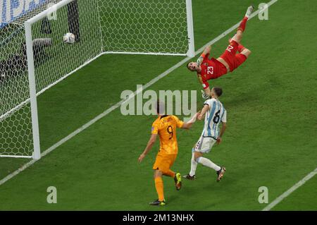 Argentina goalkeeper Emiliano Martinez fails to stop Netherlands' Wout ...