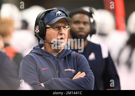 Samford head coach Chris Hatcher walks away from the huddle in a ...