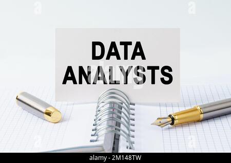 Handwriting text writing Data Analysts. Conceptual photo Programmer Design and Create Report ...