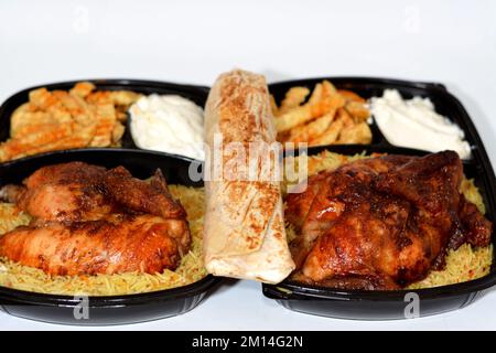 Arabic Syrian cuisine of machine grilled barbecued chicken with ...
