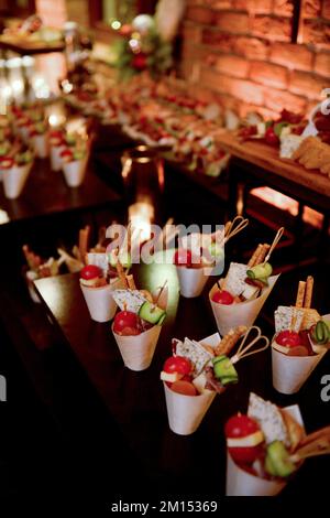 The buffet at the reception. Assortment of well decorated gourmet food ...