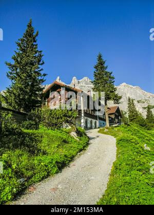 The image is of the old Totalp Hut mountain hut-refuge that was totally ...