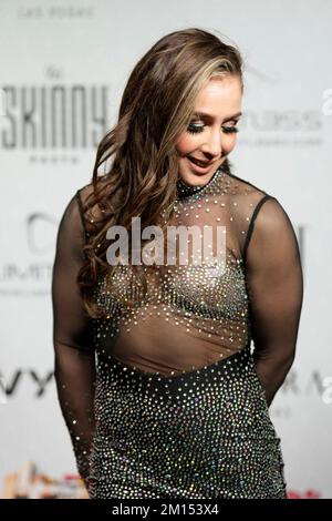 LAS VEGAS, NV - December 8: Vanessa Demopoulos walks the red carpet as ...