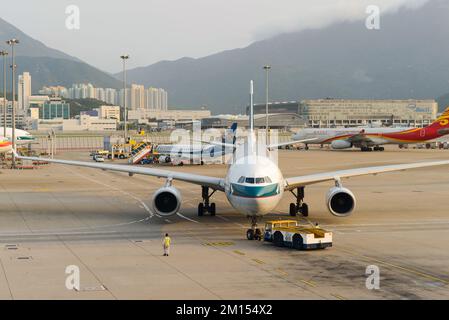 HONG KONG - APRIL 17: jet aircraft docked in airport on April 17, 2014 ...