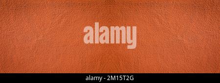 Red and burgundy colored wall texture with rough surface, two color ...