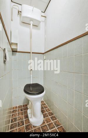 Modern Black Toilet Bowl In Minimalist Bathroom Stock Photo - Alamy