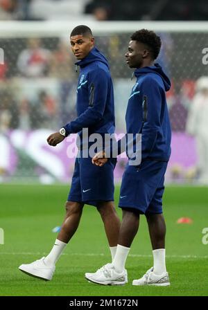 England's Marcus Rashford (left), Bukayo Saka, Ezri Konsa, John Stones ...