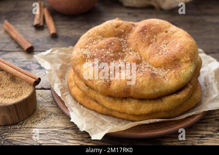 Homemade Navajo fried bread or sweet Elephant Ears with brown sugar and ...