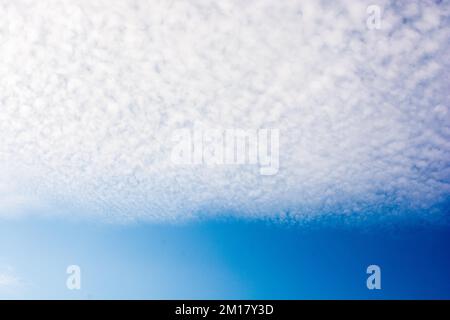 White color clouds found in the blue sky background Stock Photo - Alamy
