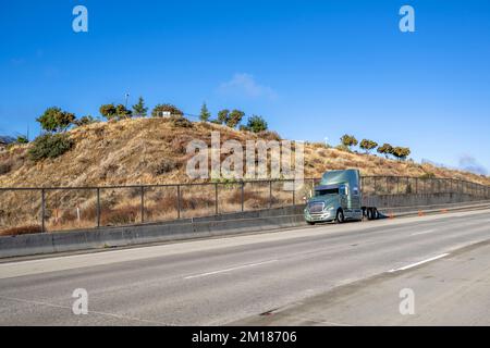 Broken big rig semi truck tractor with open hood and accident warning ...