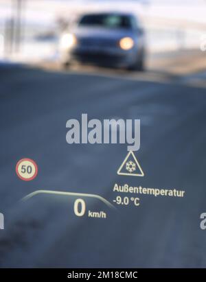 Ruderatshofen, Germany. 11th Dec, 2022. A smoking chimney stands on a ...