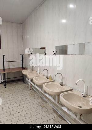 Old washroom in an abandoned factory before its demolition, Laupheim ...