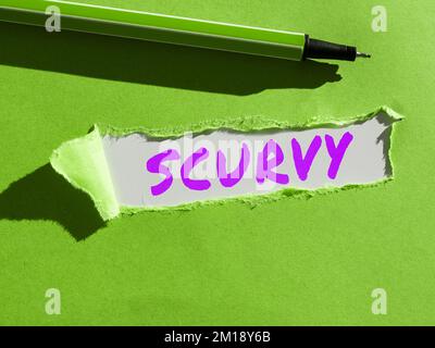 Hand writing sign Scurvy. Word Written on disease caused by a lack of ...
