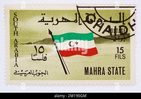 Photo of a postage stamp from the Mahra State of Qishn and Socotra Flag ...