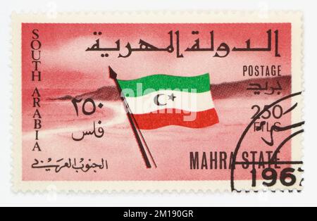 Photo of a postage stamp from the Mahra State of Qishn and Socotra Flag ...