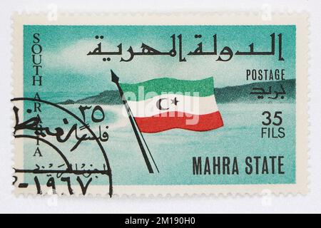 Photo of a postage stamp from the Mahra State of Qishn and Socotra Flag ...
