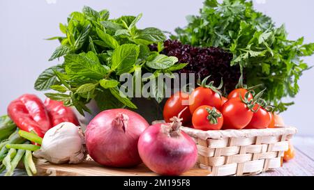 Freshly picked vegetables, cherry tomatoes, mint, green onions, lettuce ...