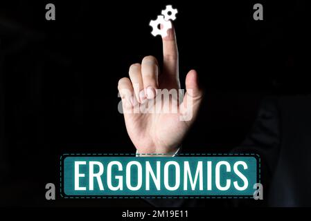 Hand writing sign Ergonomics, Word Written on fitting or designing a ...