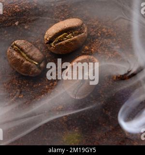 Ground coffee and coffee beans, lightly smoked coffee, coffee texture ...