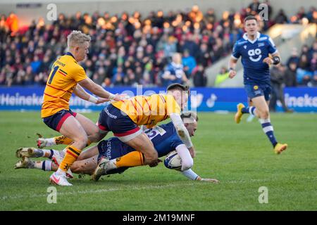 Byron McGuigan #23 of Sale Sharks inspects the pitch before the ...