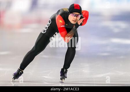 CALGARY, CANADA - DECEMBER 9: Jingzhu Jin of China competing on the ...