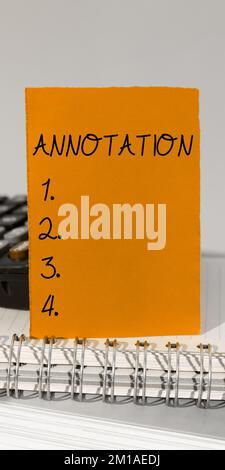 Writing displaying text Annotation. Business concept note added by way of comment or explanation ...