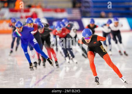CALGARY, CANADA - DECEMBER 11: Hongli Wang of China competing on the ...