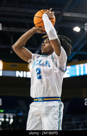 UCLA guard Dylan Andrews (2) shoots the ball over Maryland guard Rodney ...