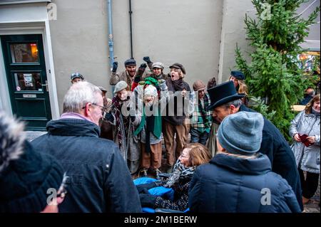 Scrooge and young woman - Charles Dickens characters during "Dickens ...