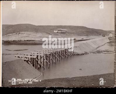 Wachusett Reservoir, pile trestle and embankment of soil stripping ...
