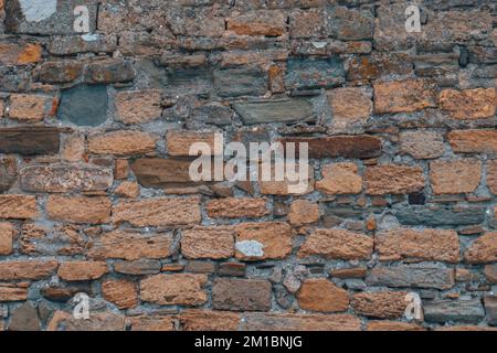 Ancient broken sandstone wall and ble sky Stock Photo - Alamy