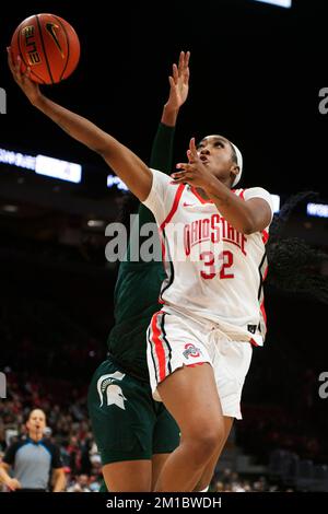 Ohio State forward Cotie McMahon, right, shoots in front of Purdue ...