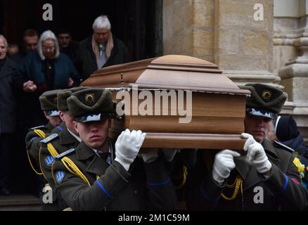 Lviv, Ukraine. 10th Dec, 2022. Military honor guards carry the coffin ...