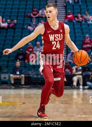 Washington State guard Justin Powell defends during overtime of an NCAA ...