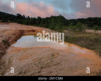 the big pothole on the isolated or vacant land Stock Photo - Alamy
