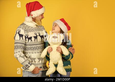 Christmas is coming. small girl love father man. xmas morning. dad and ...