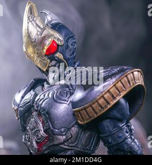 A closeup shot of SIC Kamen Rider Blade Ace Form figure on dark background filled with smoke ...